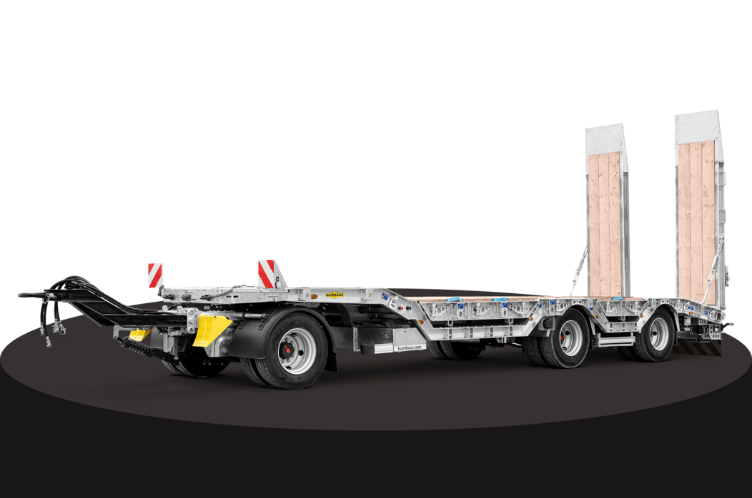 Humbaur | Tieflader mit Extras für Baumaschinen- und Containertransport