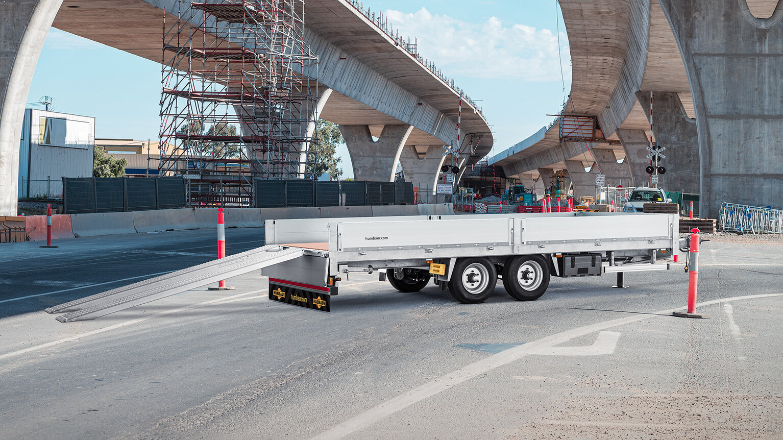Humbaur | The tandem construction machine transporter HBT BE 10t from ...